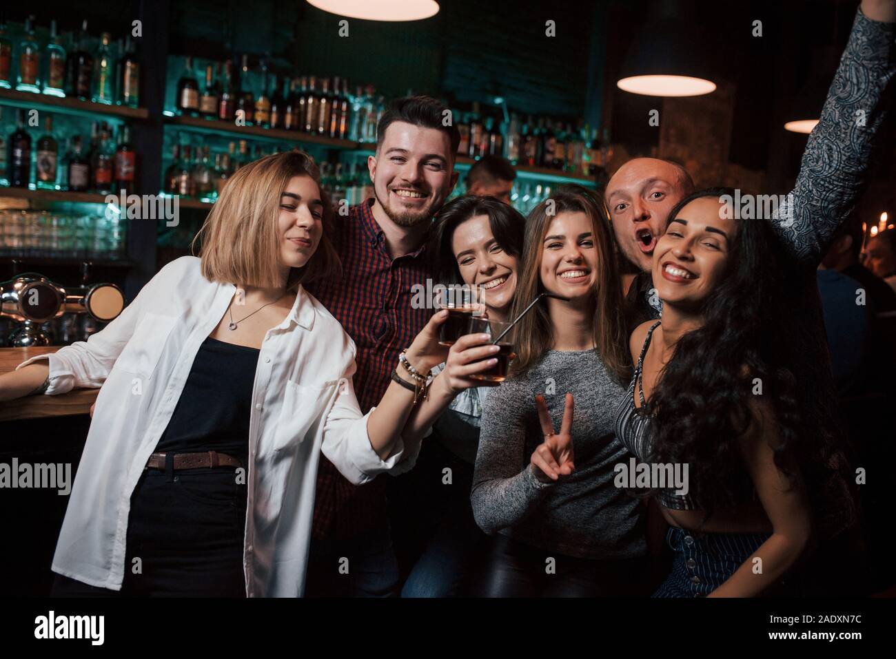 Happy eyes. Beautiful youth have party together with alcohol in the ...