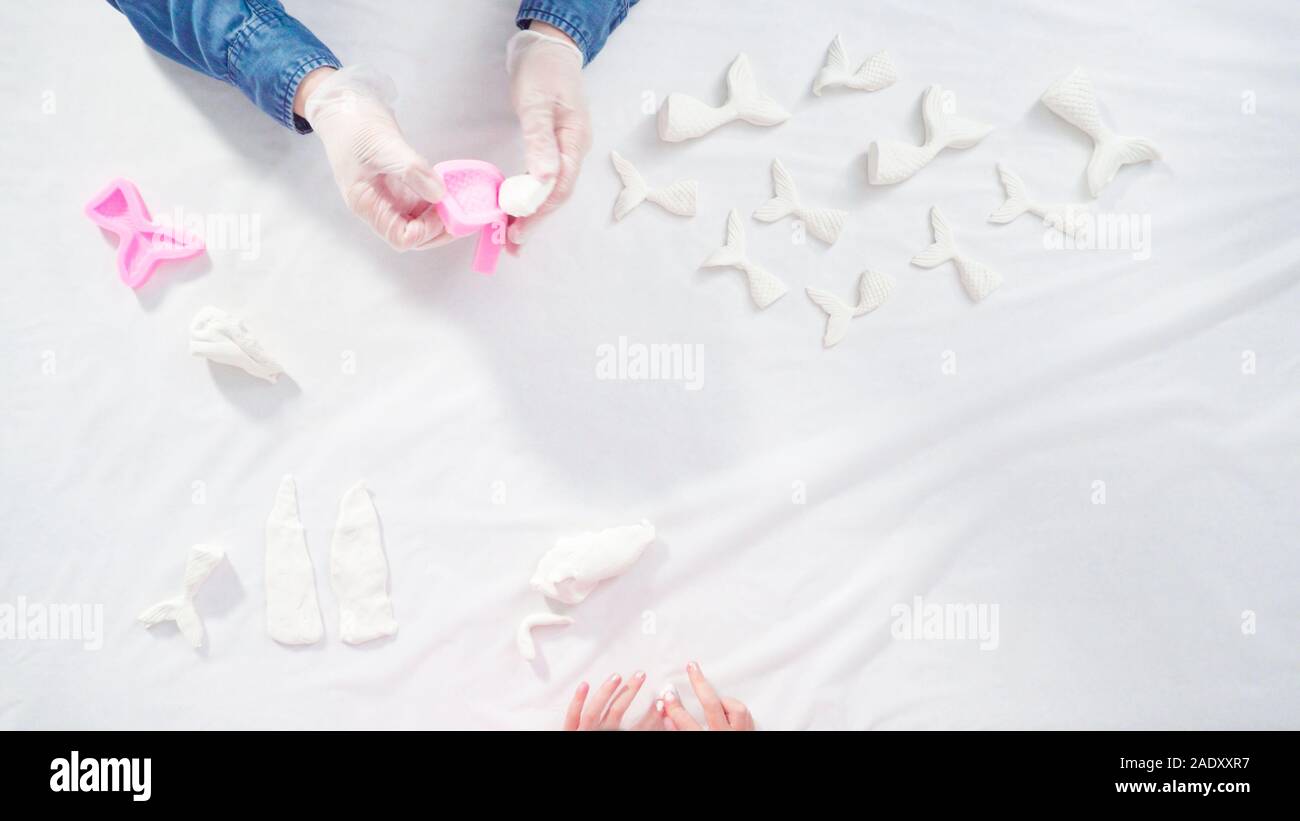 Flat lay. Step by step. Making mermaid tail from modeling clay in ...