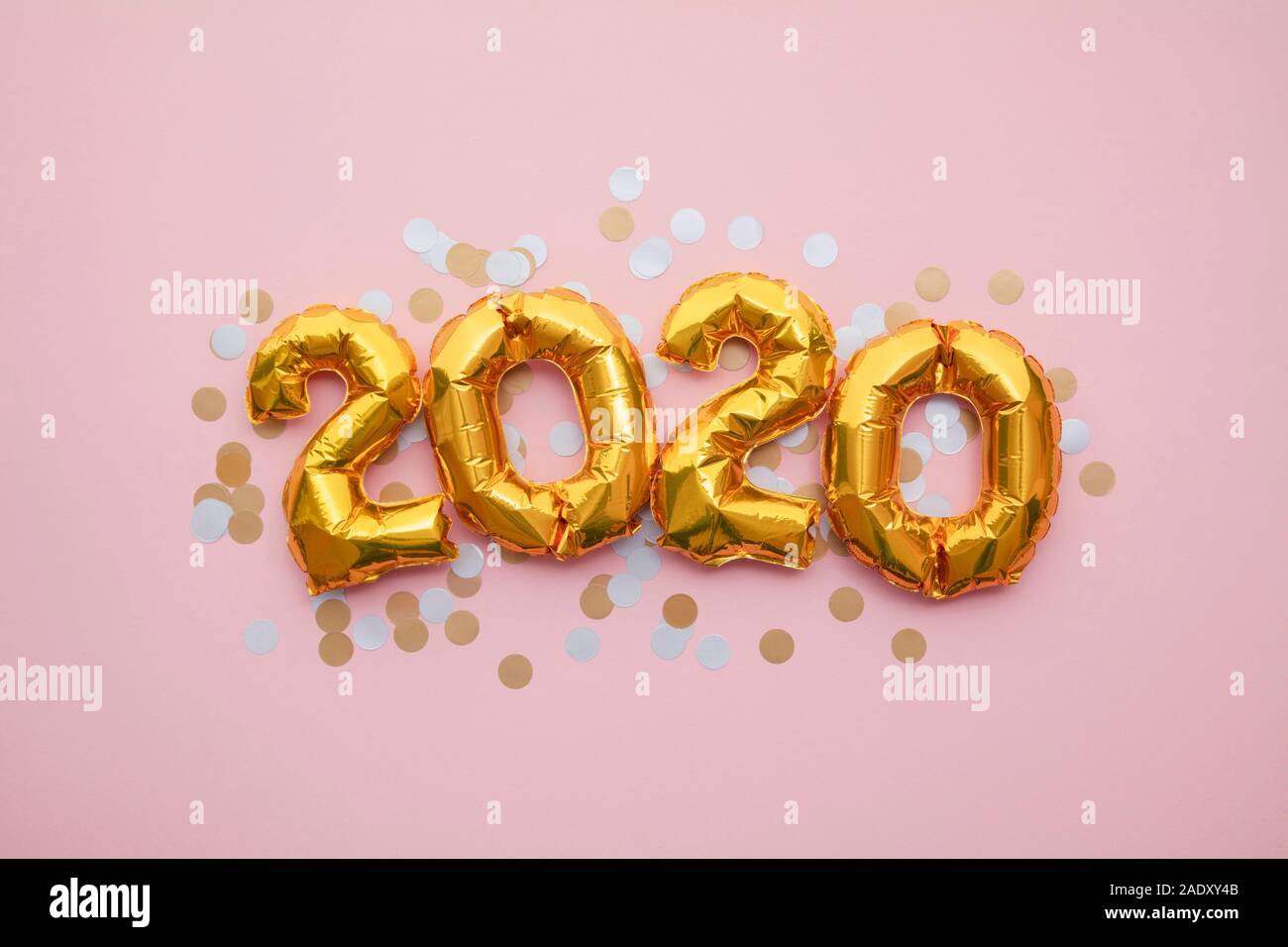 2020 New year party celebration. Gold foil party balloons with ...