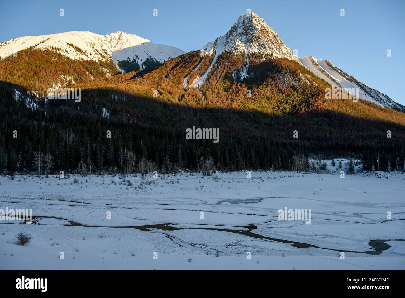 Winter landscape of the frozen Lake Medicine surrounded by the Colin ...
