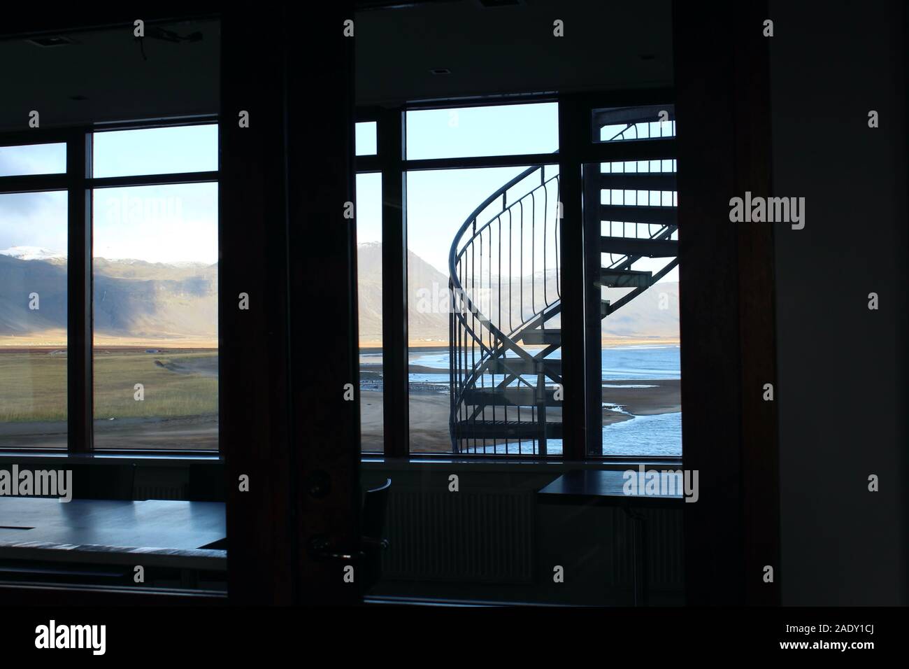 Looking through a window at the ocean at sunset Stock Photo - Alamy