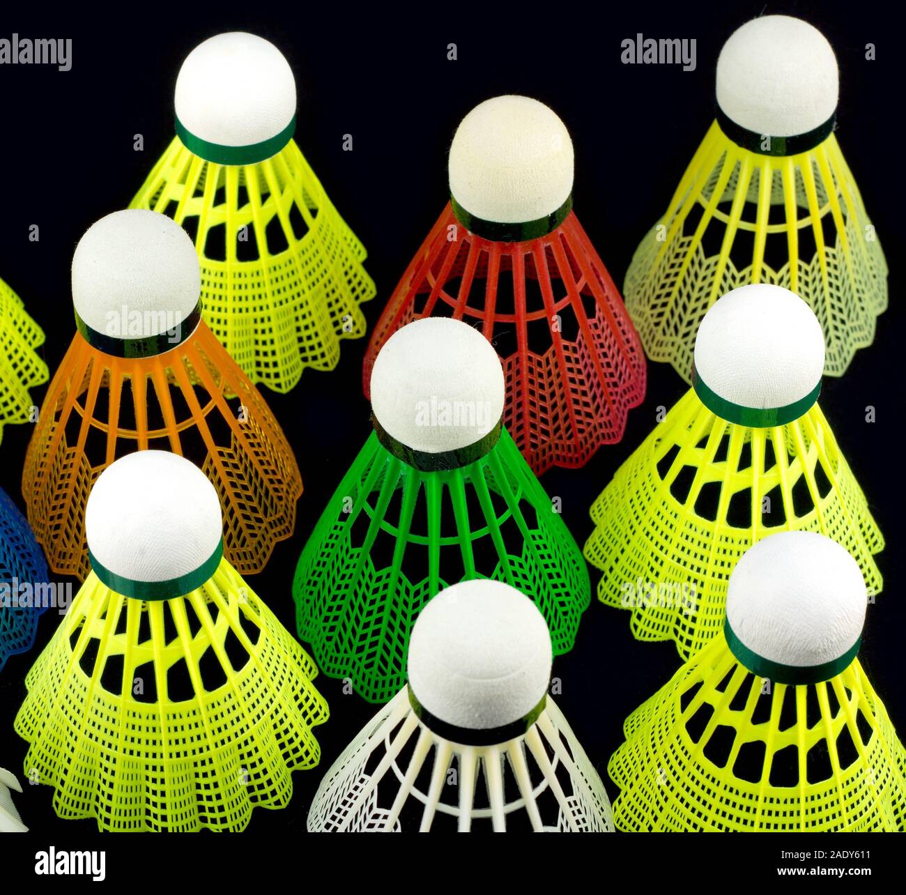 Many color badminton shuttlecocks with white corks isolated on black ...