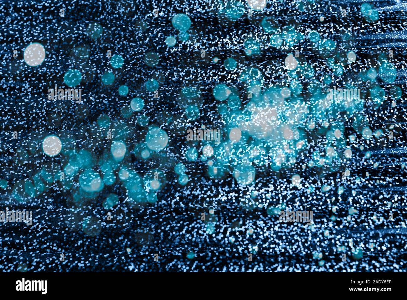 Photo of holographic real texture in blue colors, magic iridescent ...