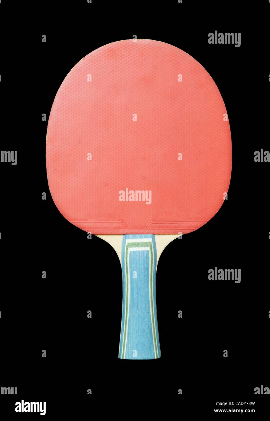 Racquet for table tennis with red side isolated on black background ...