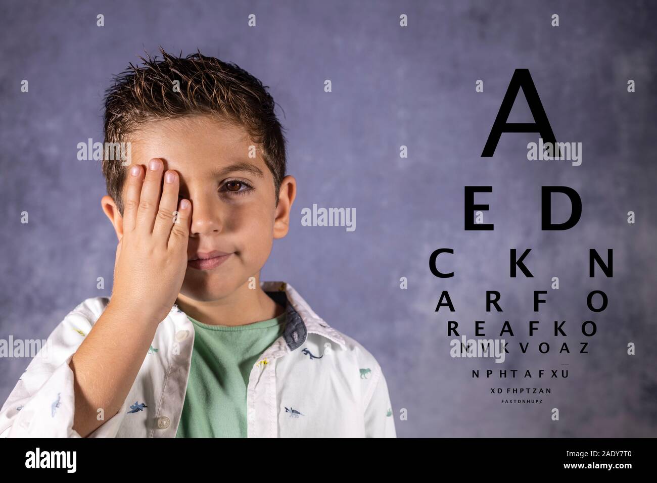 Little boy testing his vision. Oculist concept Stock Photo - Alamy