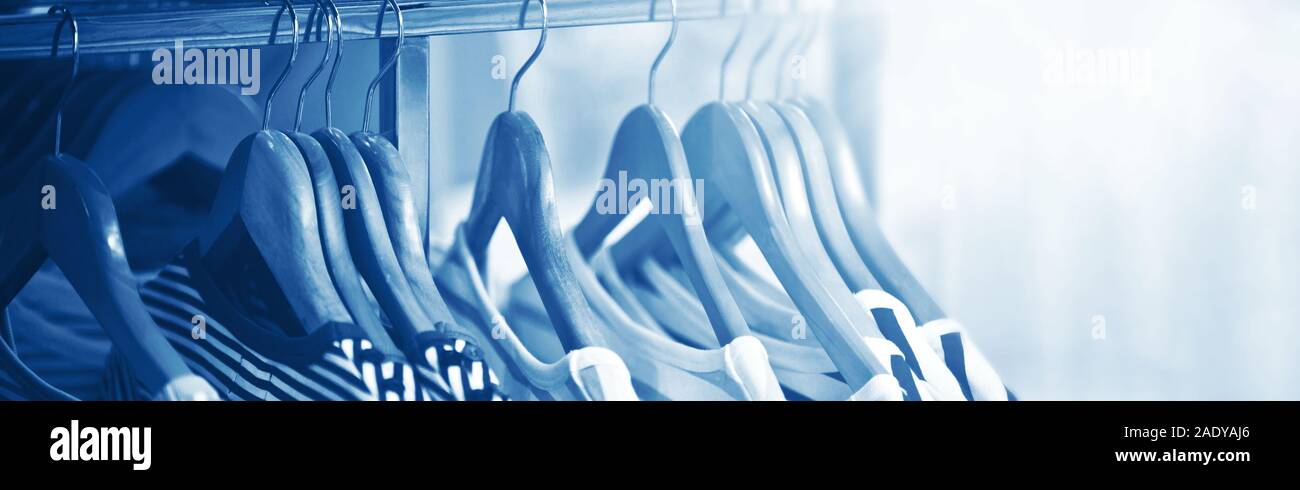 Striped Female Pullovers in a Clothing Store. Long wide banner with ...