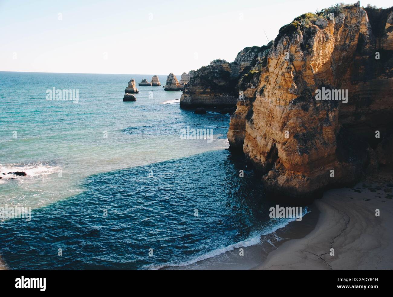 Tall rocks at the beach Stock Photo - Alamy