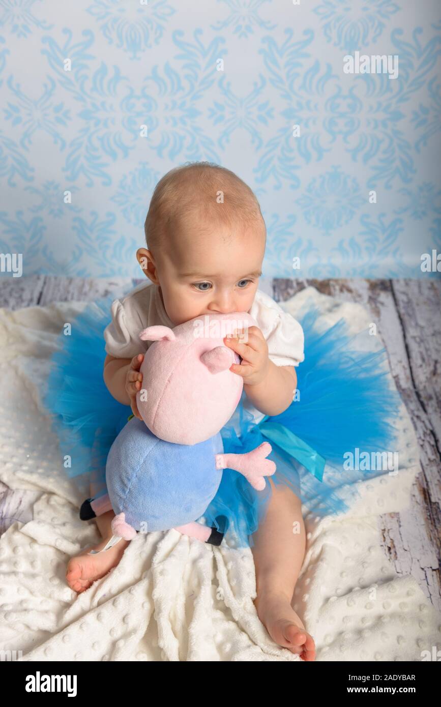 Portrait of adorable baby girl. Childhood. Authentic image Stock Photo ...