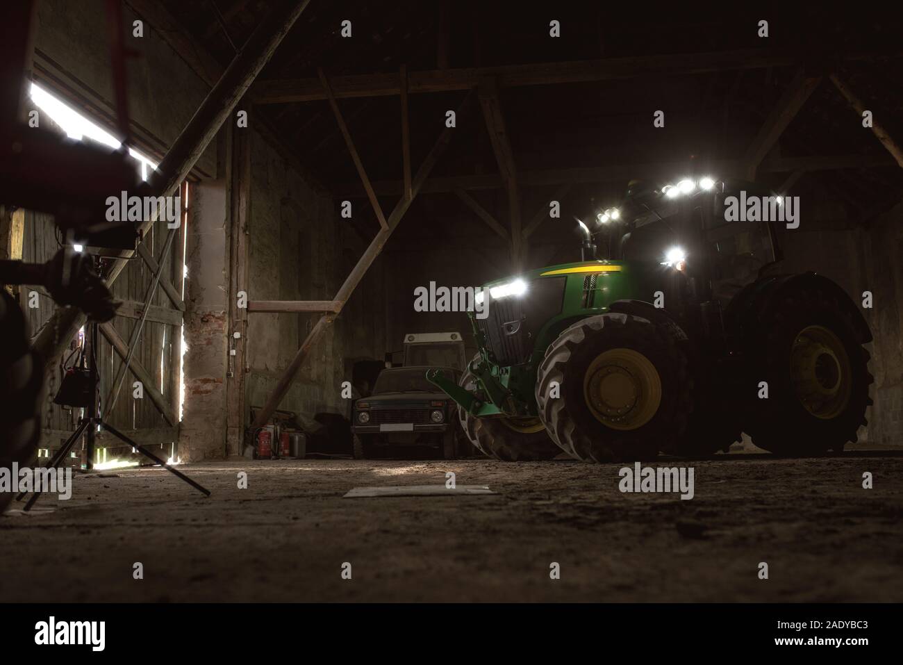 Tractor parked in barn hi-res stock photography and images - Alamy