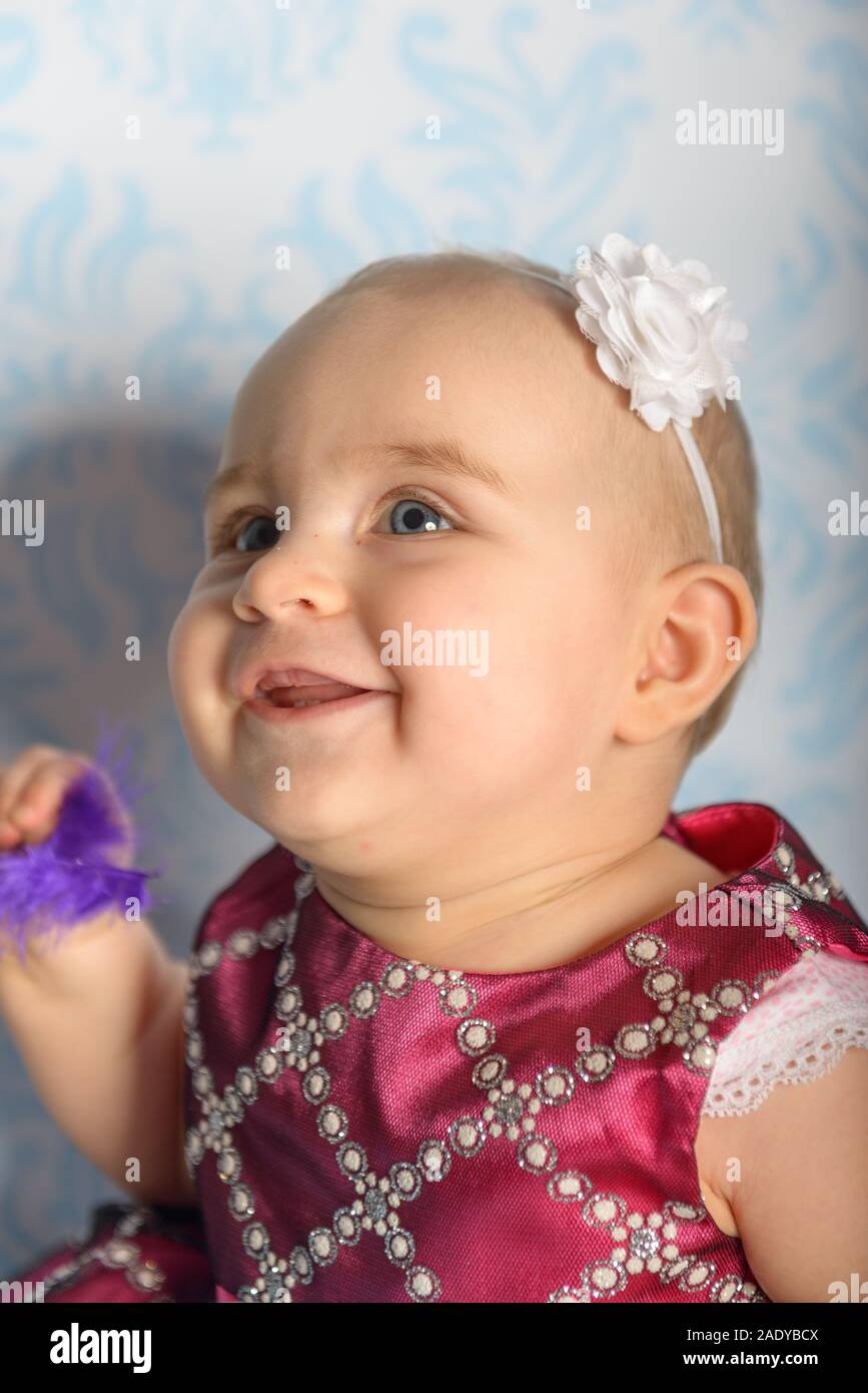Portrait of adorable baby girl. Childhood. Authentic image Stock Photo ...