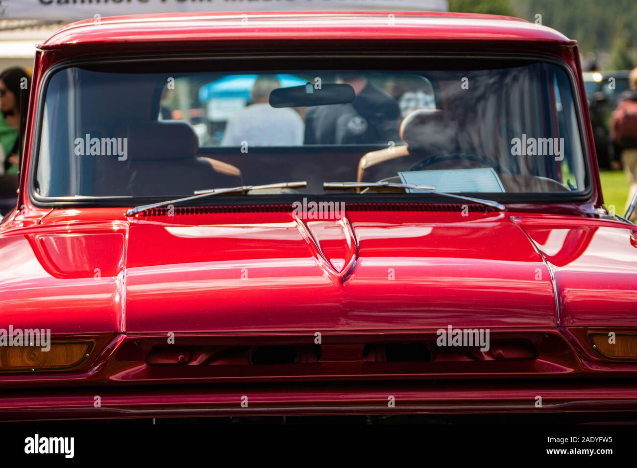 old classic antique American red car front, view of the windscreen ...