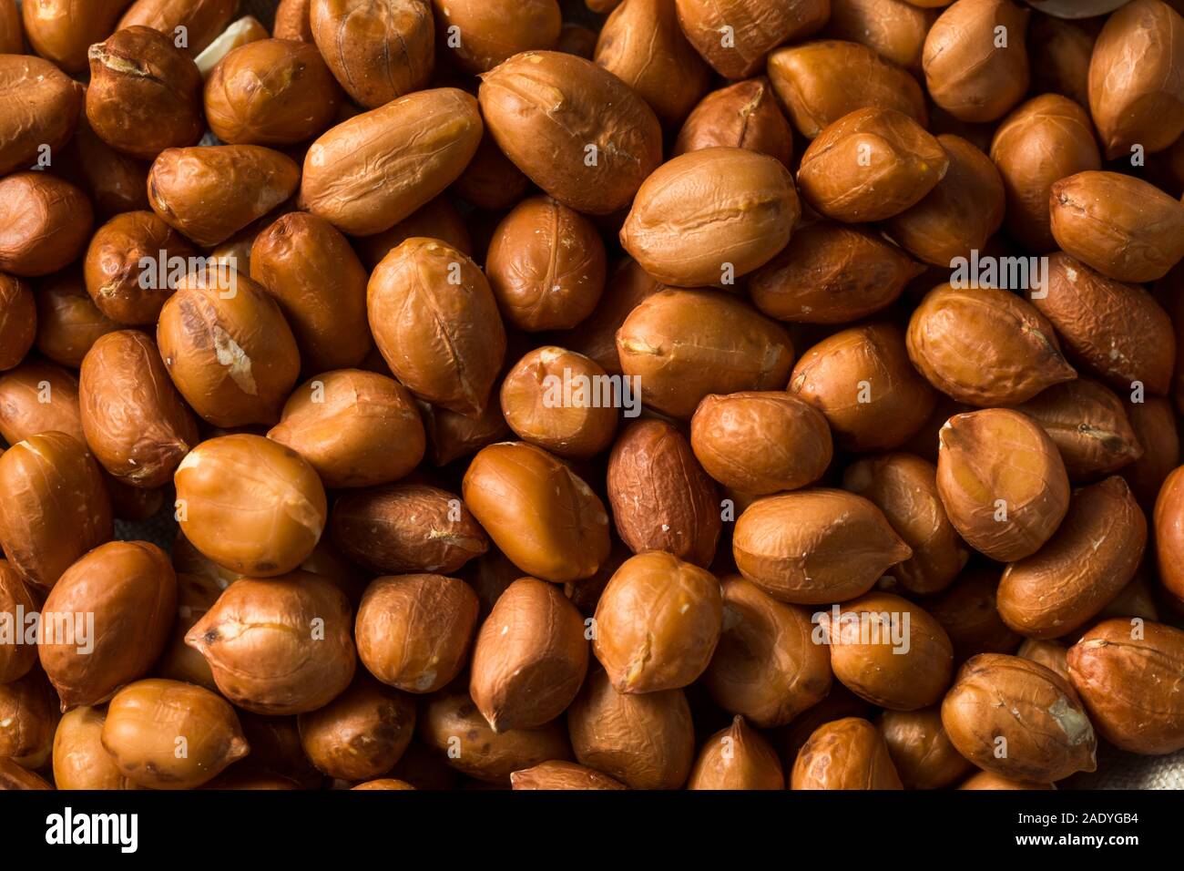 Raw Brown Organic Spanish Peanuts Ready to Eat Stock Photo - Alamy