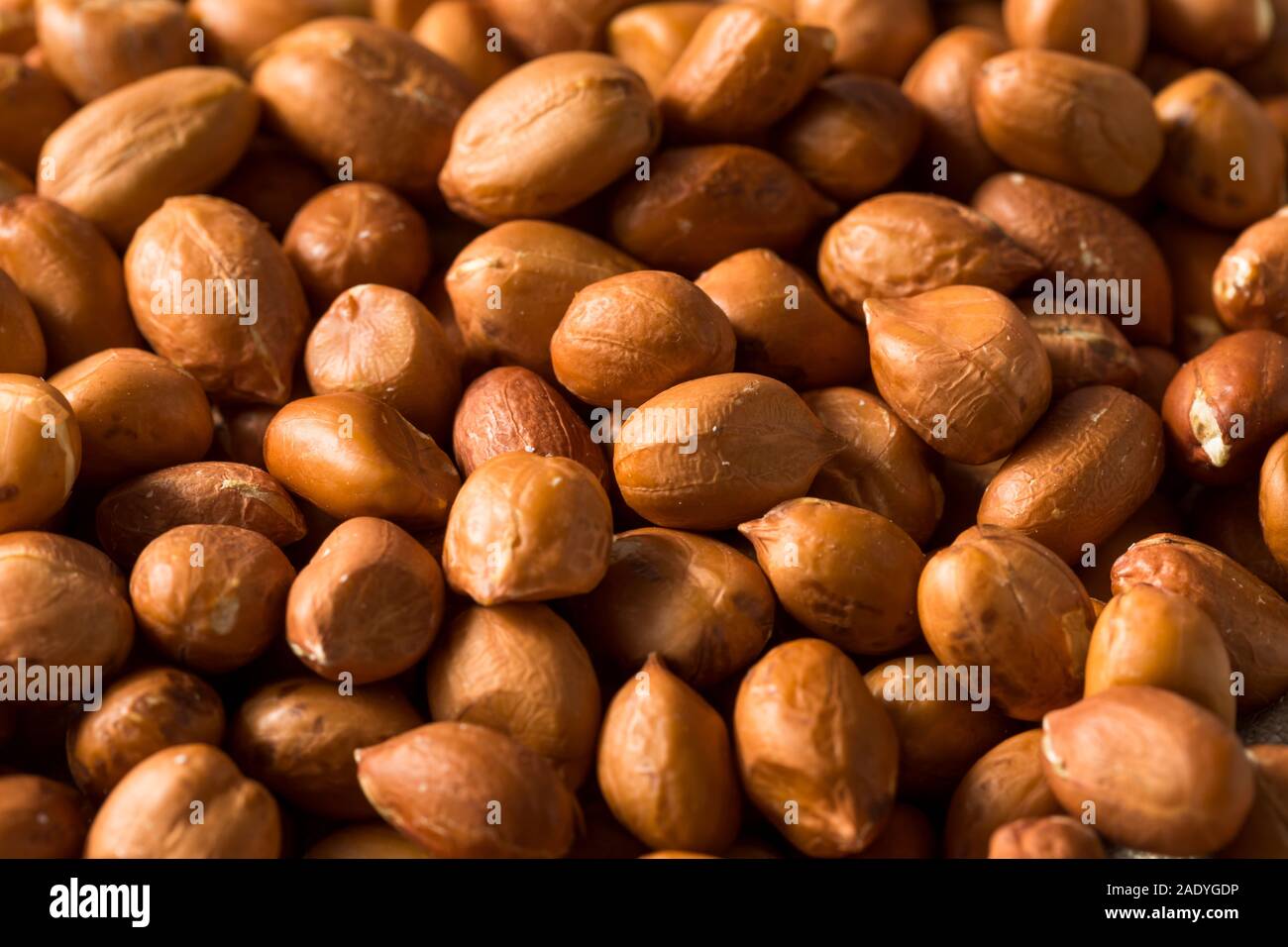 Raw Brown Organic Spanish Peanuts Ready to Eat Stock Photo - Alamy