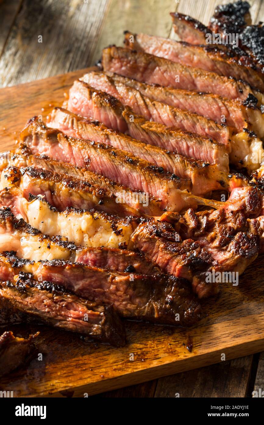 Homemade Grilled Sugar Steak with Potatoes and Peas Stock Photo - Alamy