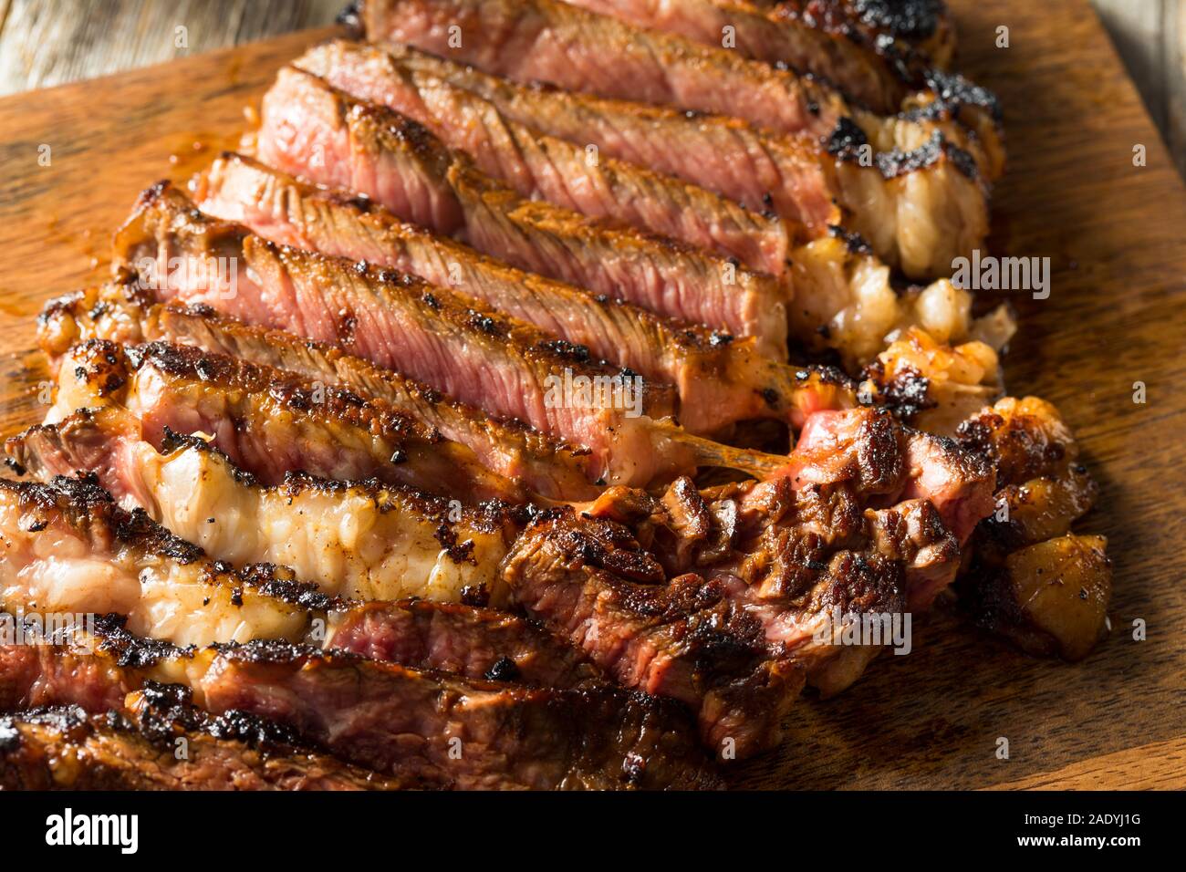 Homemade Grilled Sugar Steak with Potatoes and Peas Stock Photo - Alamy