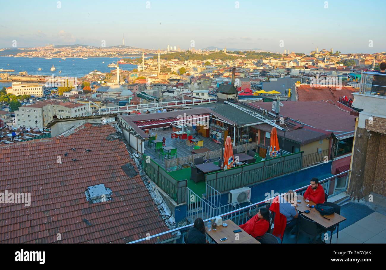 Istanbul, Turkey - September 7th 2019. Customers at a rooftop bar enjoy ...