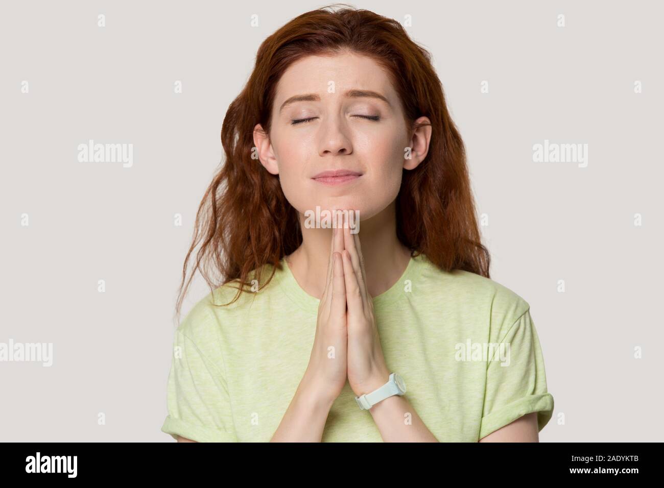 Millennial sincere female prayer asking for good luck Stock Photo - Alamy