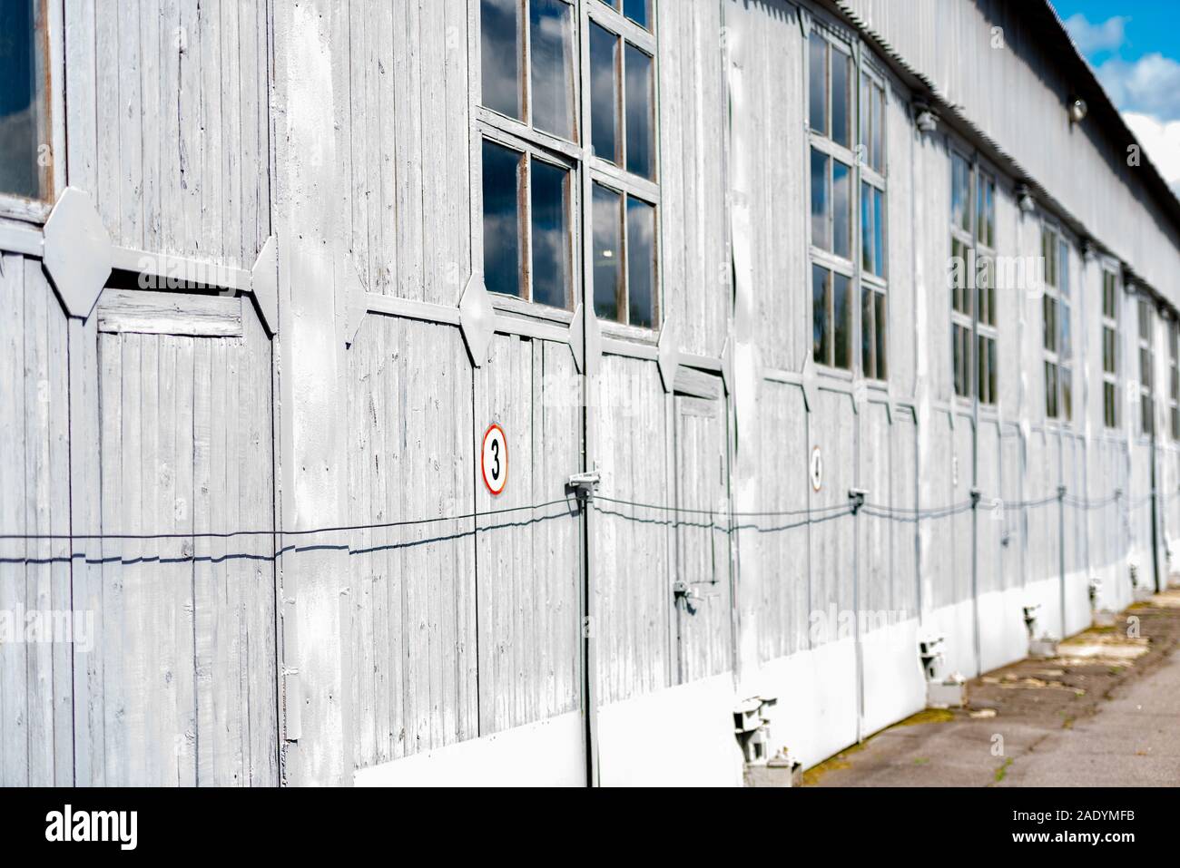Tank hangar. Old military hangar for equipment Stock Photo - Alamy