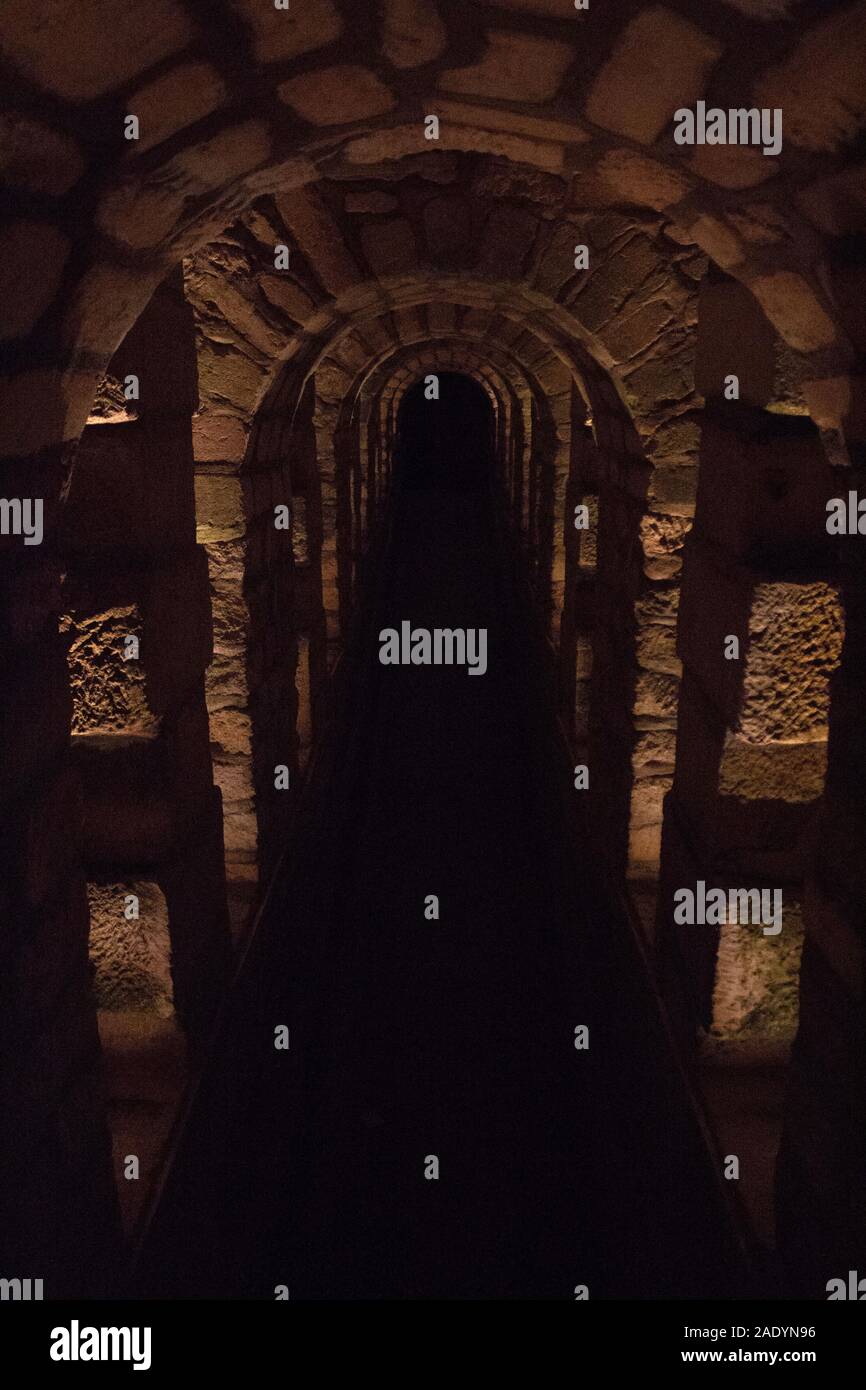 The tunnels of the Catacombs of Paris an underground ossuary in Paris ...