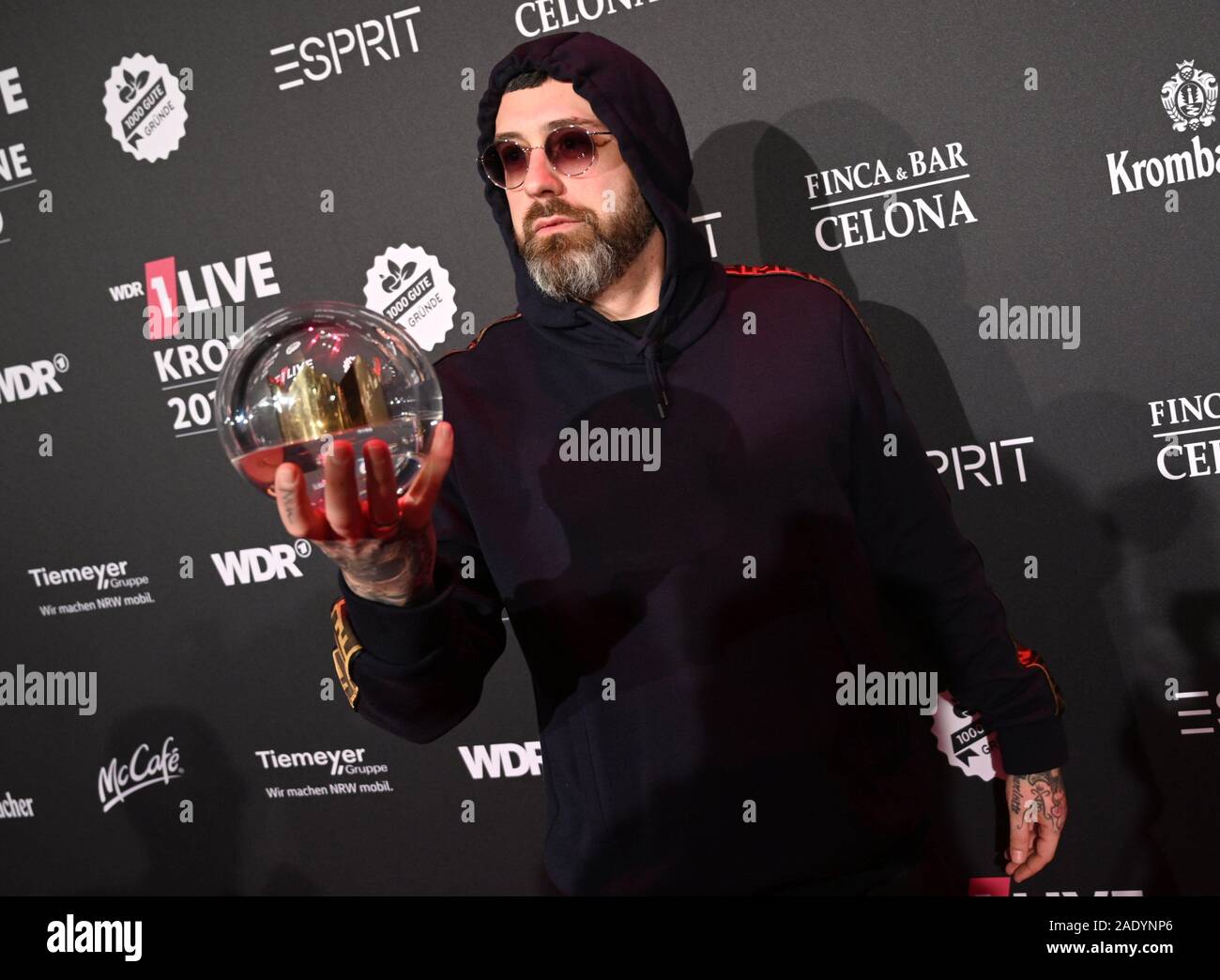 Cologne, Germany. 05th Dec, 2019. Rapper Sido is delighted to receive ...