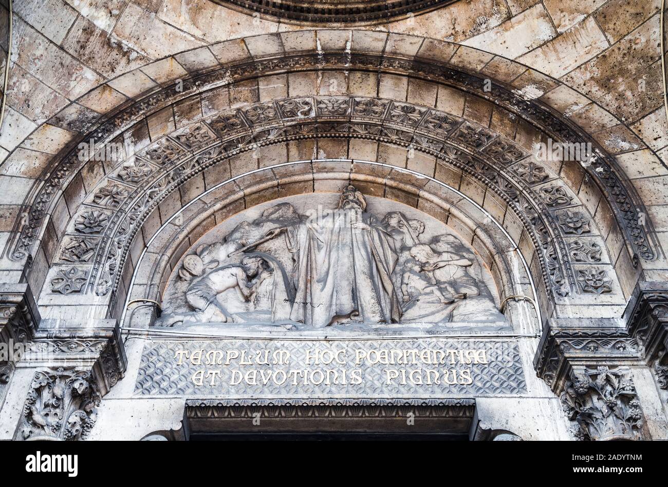 The bas-relief above the entrance to the Basilica of the Sacred Heart ...