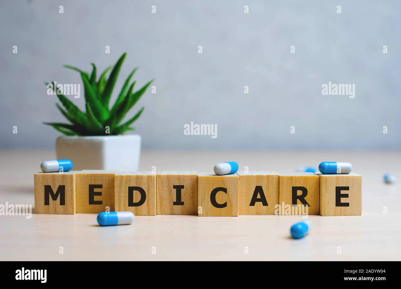MEDICARE word made with building blocks, medical concept background ...