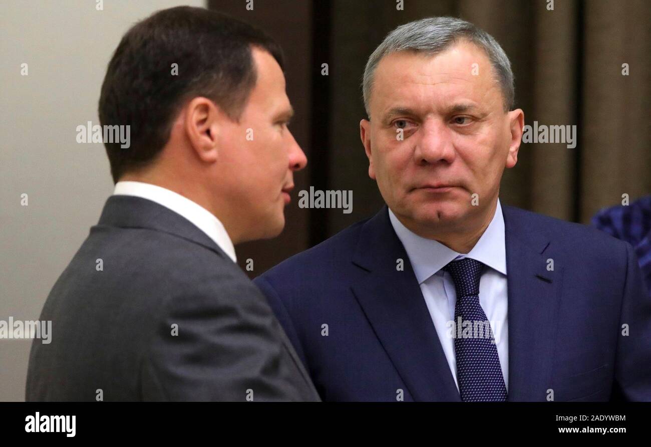 Russian Deputy Prime Minister Yury Borisov, right, before a meeting of ...