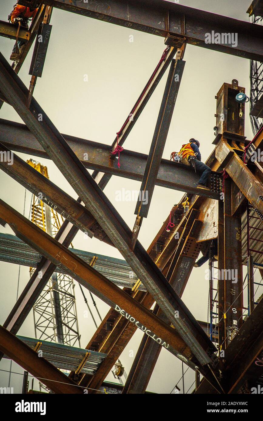 Steel beam construction workers on high rise office building in Hudson ...