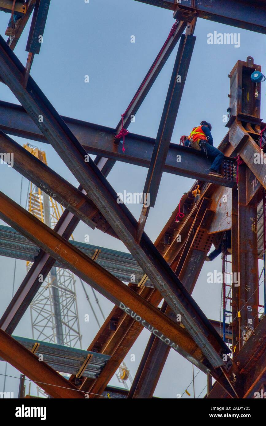Steel beam construction workers on high rise office building in Hudson ...