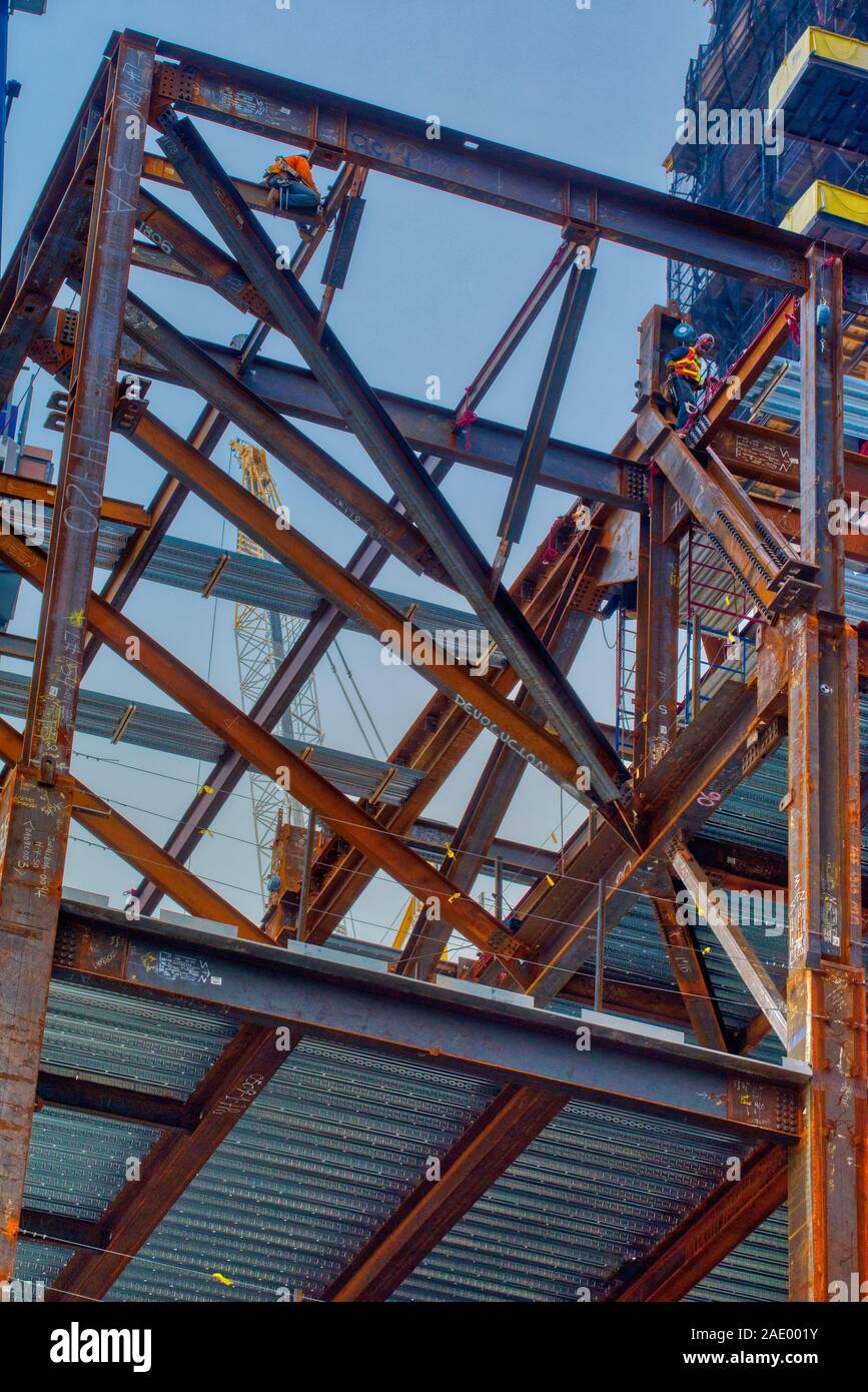 Steel beam construction workers on high rise office building in Hudson ...
