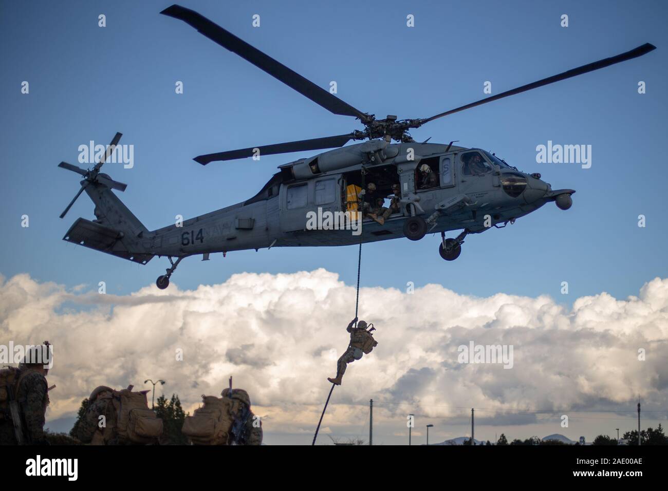 U.S. Marines conduct helicopter rappelling drills with SH-60 Seahawks ...
