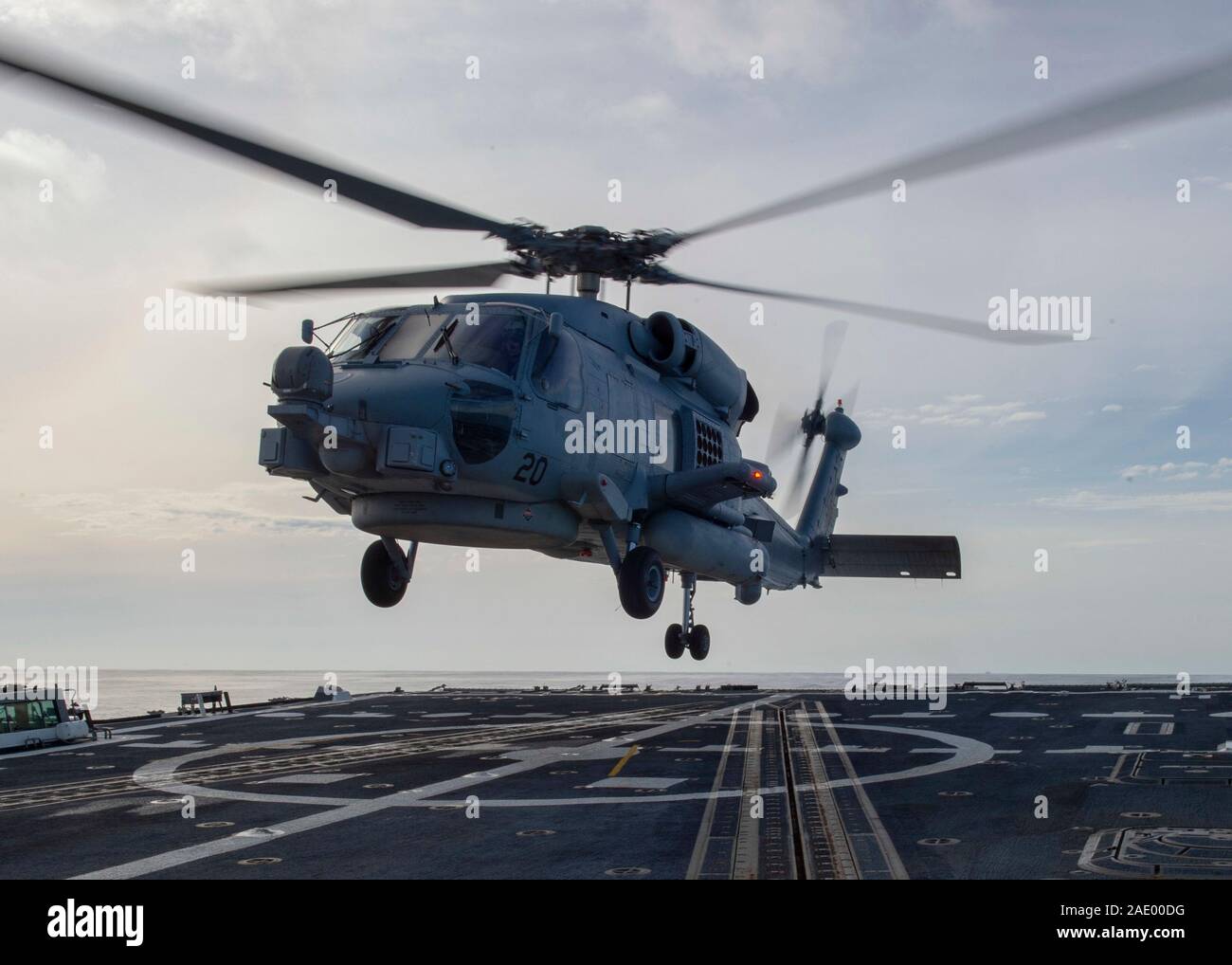 PACIFIC OCEAN (Dec. 2, 2019) An MH-60R Sea Hawk, assigned to the “Wolf ...