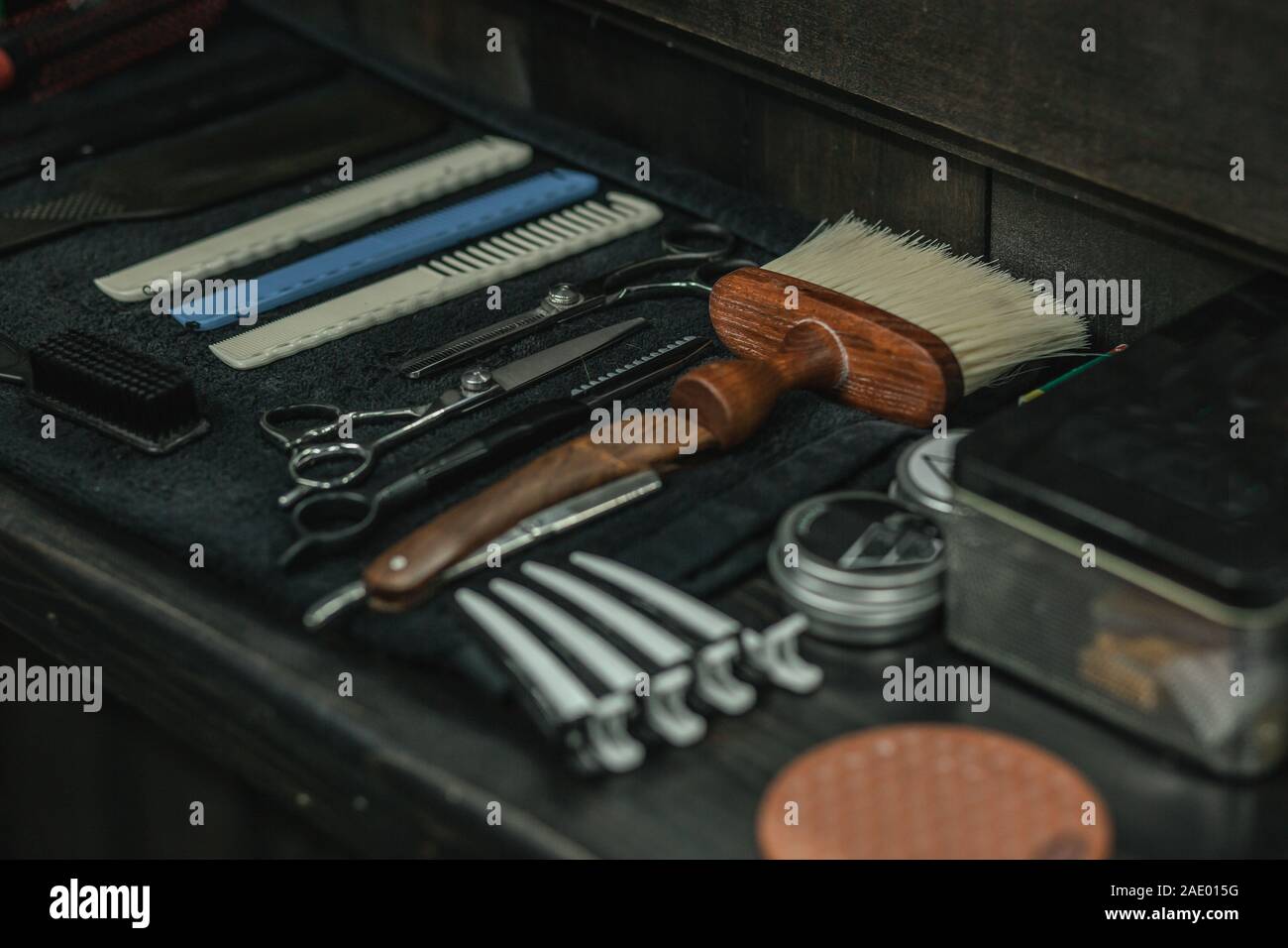Close up of scissors brushes and razors on the table Stock Photo - Alamy