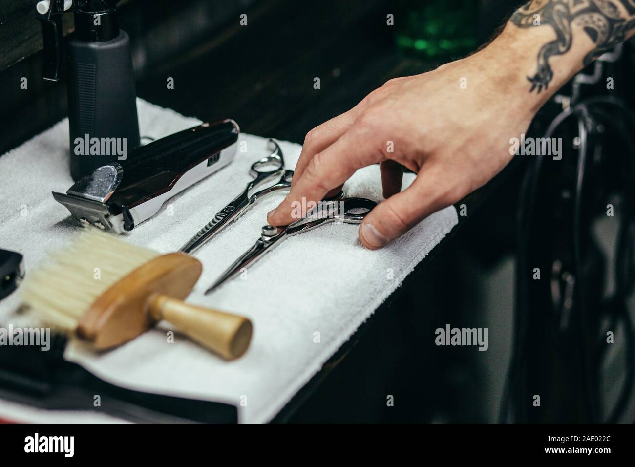 Male hand touching scissors on the towel Stock Photo - Alamy