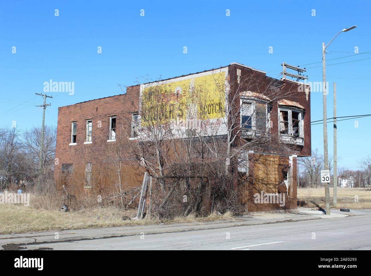 Ghost sign painted on an abandoned Detroit building in the Poletown ...