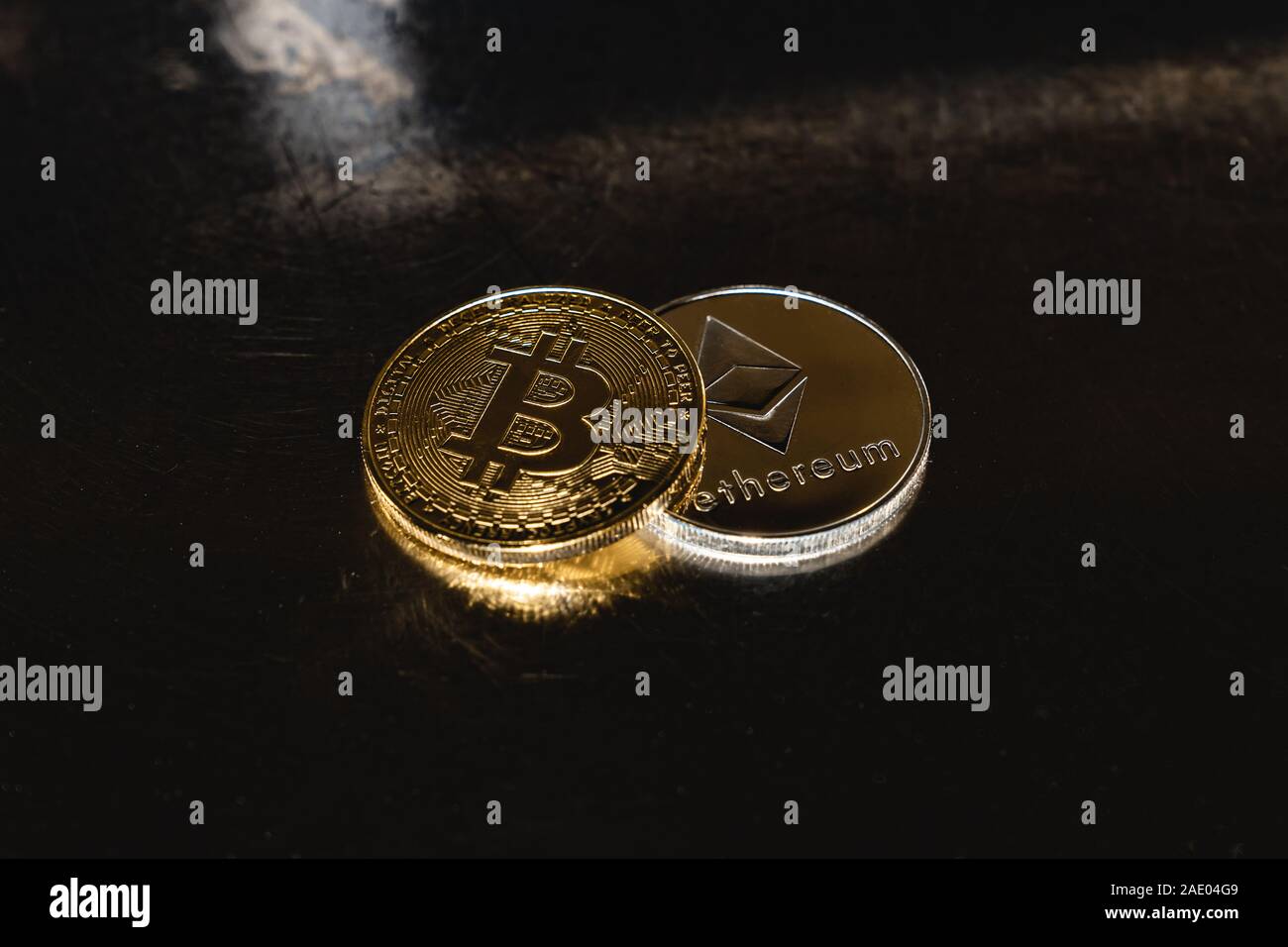 Bitcoin on a dark background. Ethereum and bitcoin rise and fall in ...