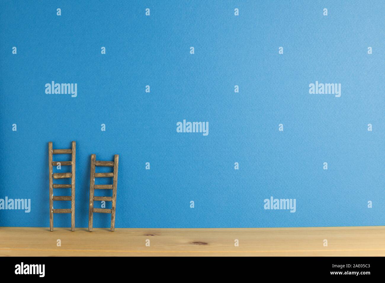Wooden ladder with blue background. Development growth concept Stock ...