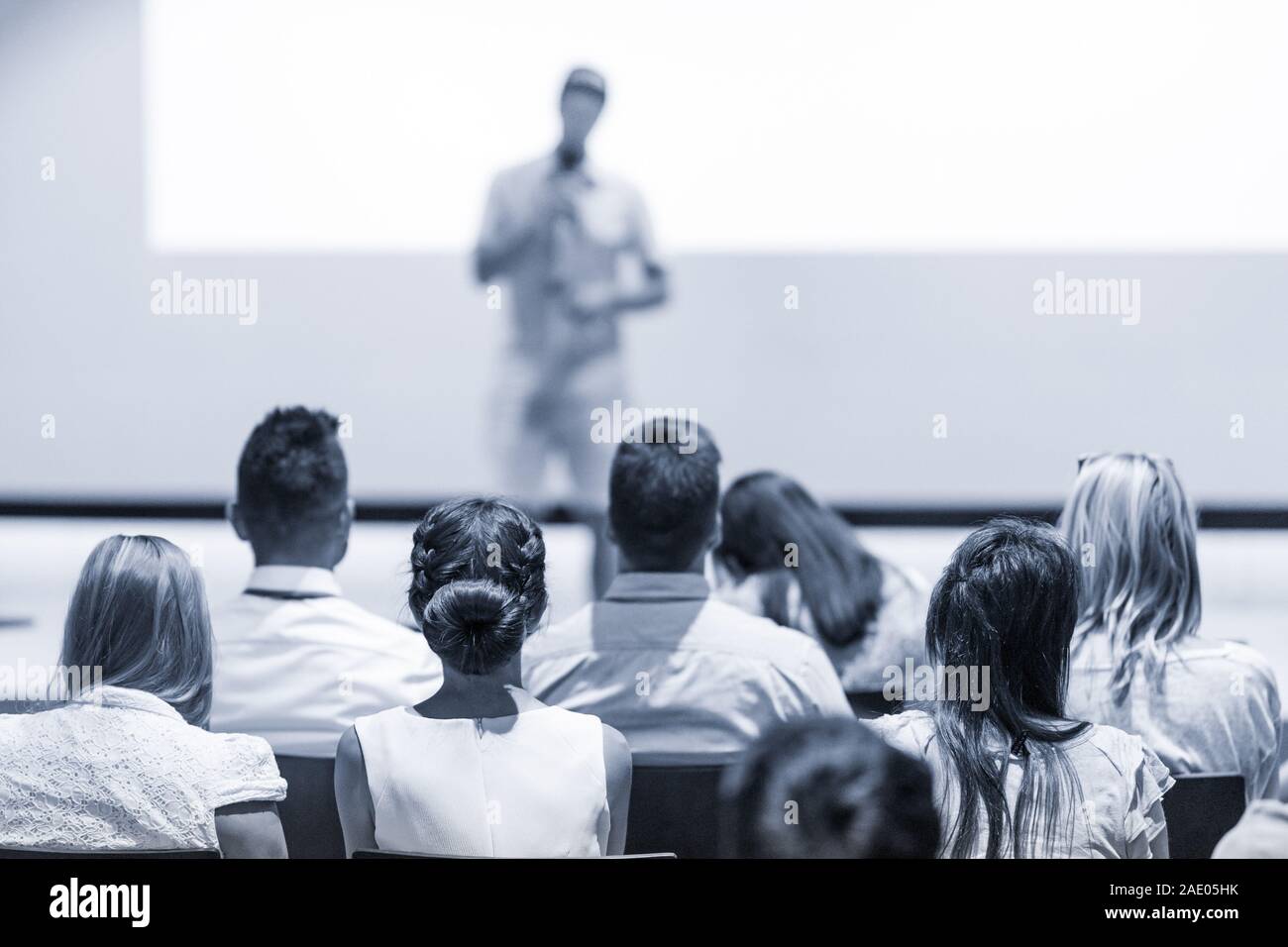 Male business speaker giving a talk at business conference event Stock ...
