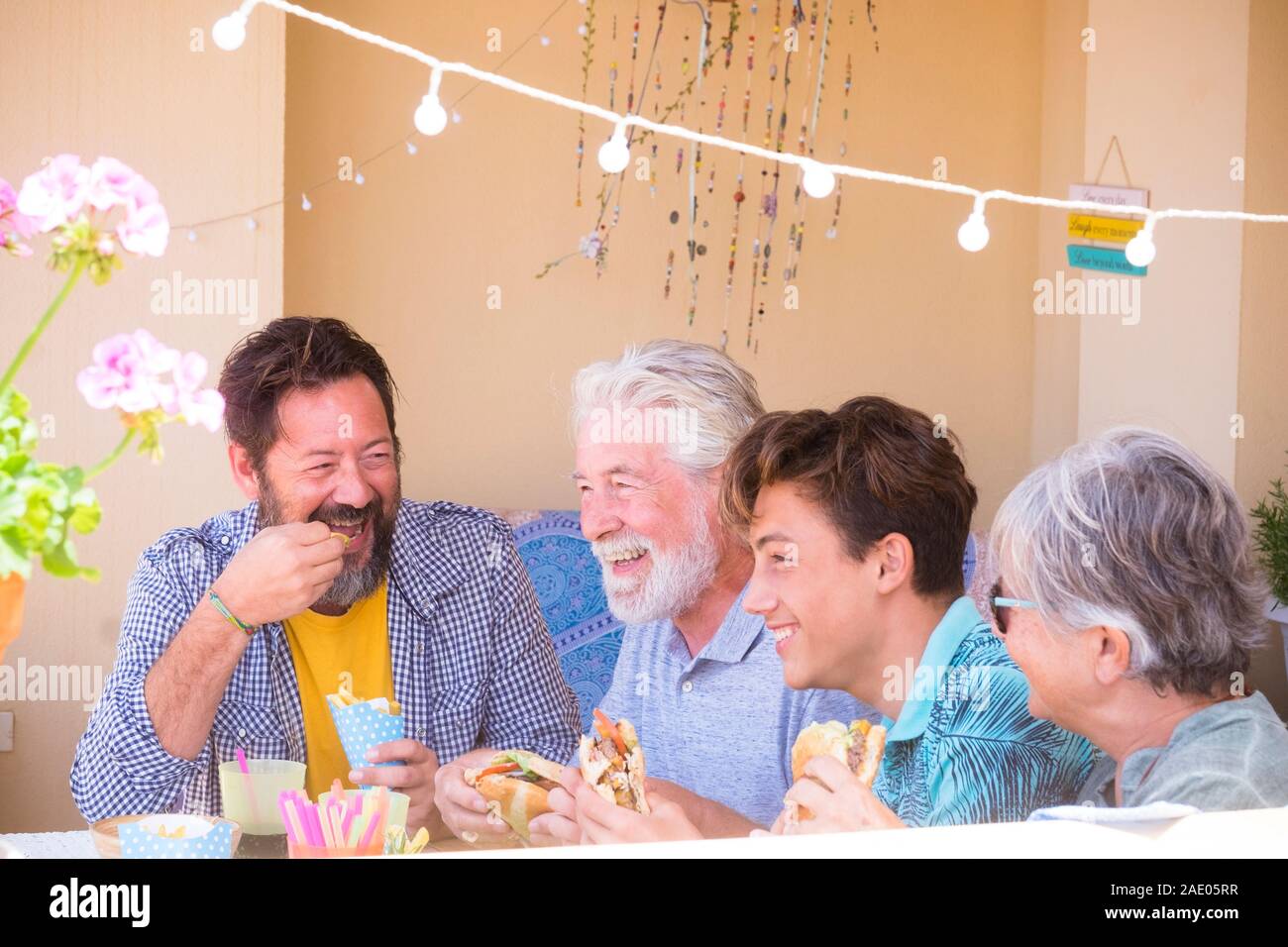 Family caucasian people with mixed generations and years age have fun ...