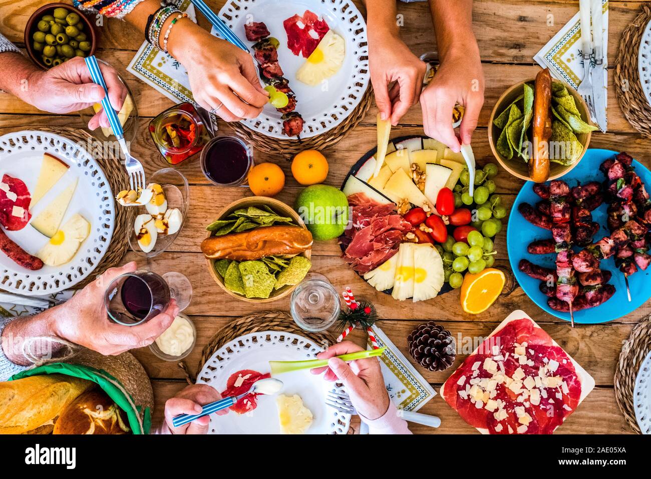 Above view of table full of coloured food for dinner or lunch activity ...