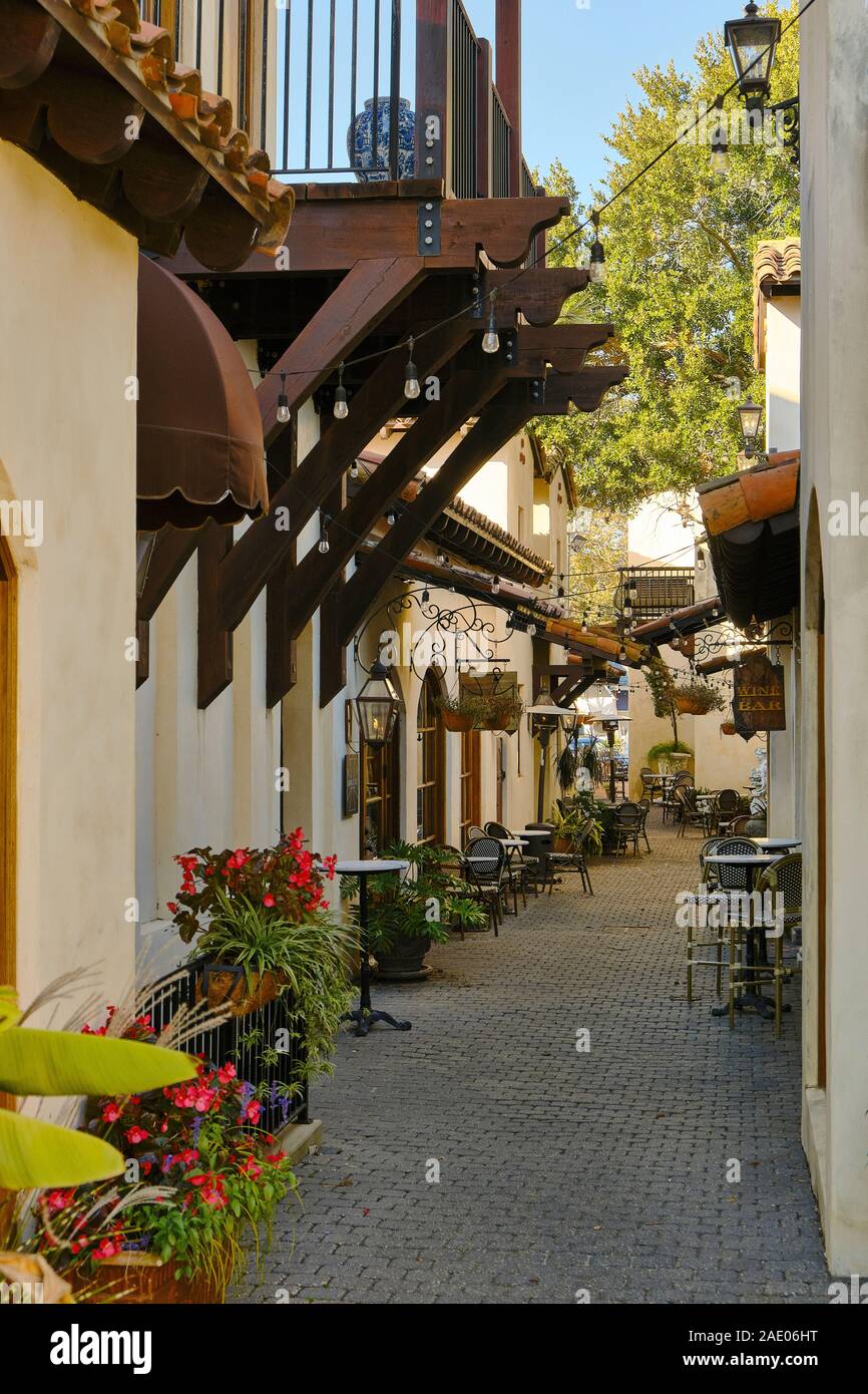 Shops, restaurants and bars down a walkway in Fairhope Alabama, USA ...
