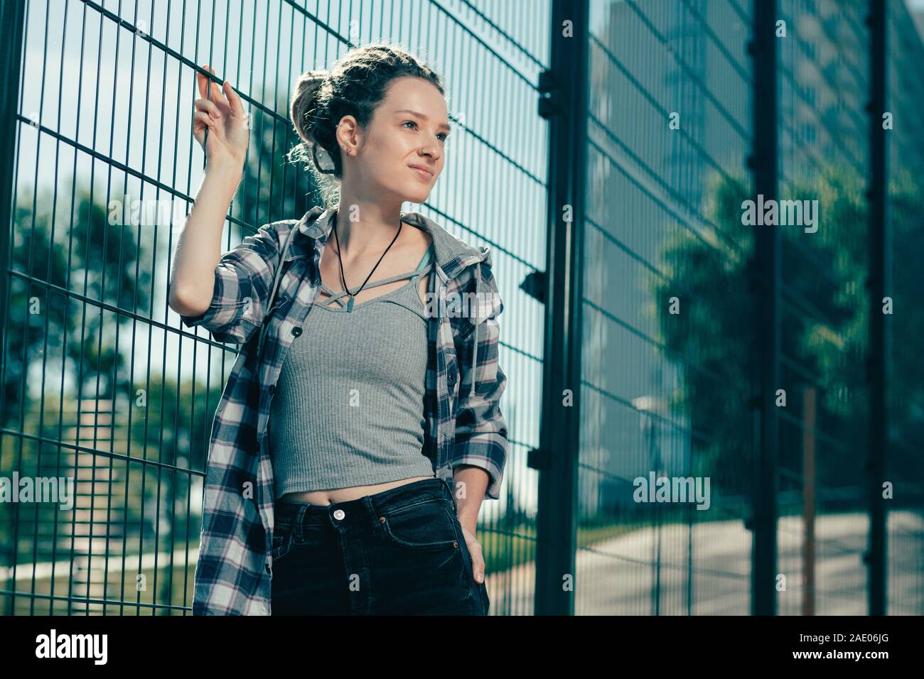 Pretty lady looking into the distance and smiling cheerfully Stock ...