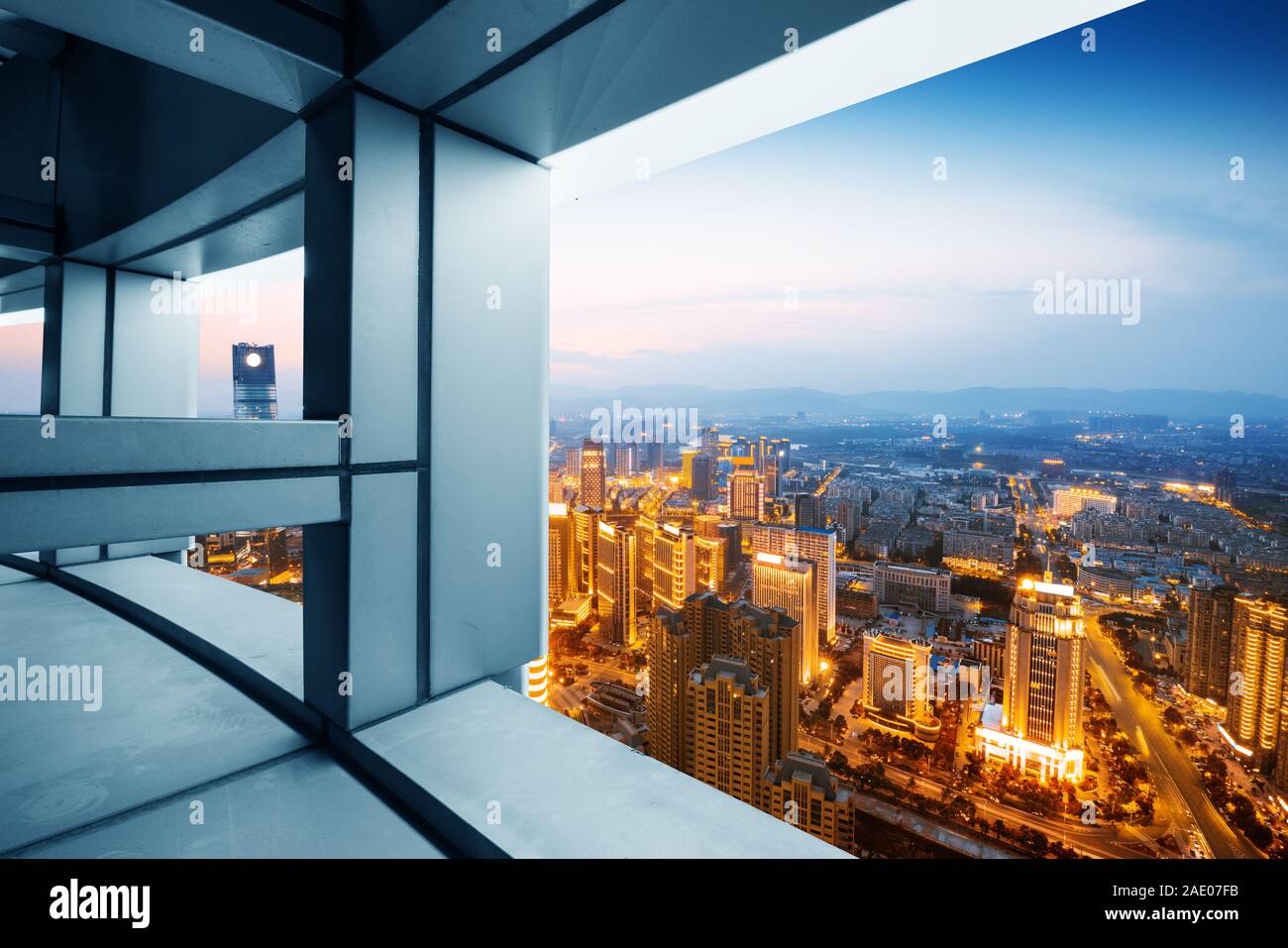 A bird's eye view of the city night view outside the window Stock Photo ...