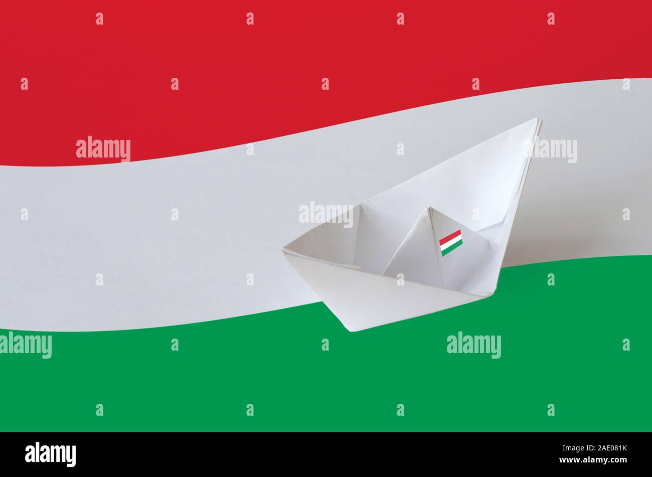 Hungary flag depicted on paper origami ship closeup. Oriental handmade ...