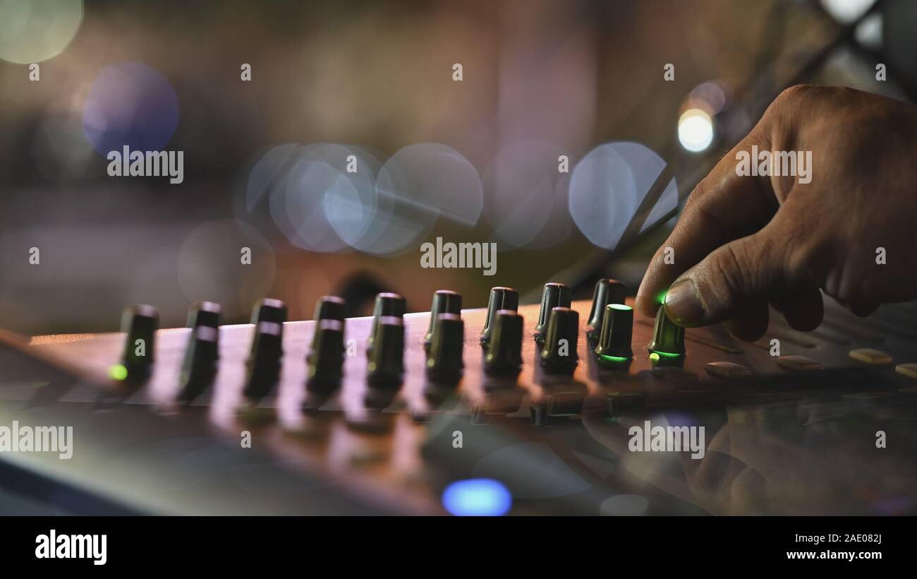 Audio sound mixer console with night time Stock Photo - Alamy