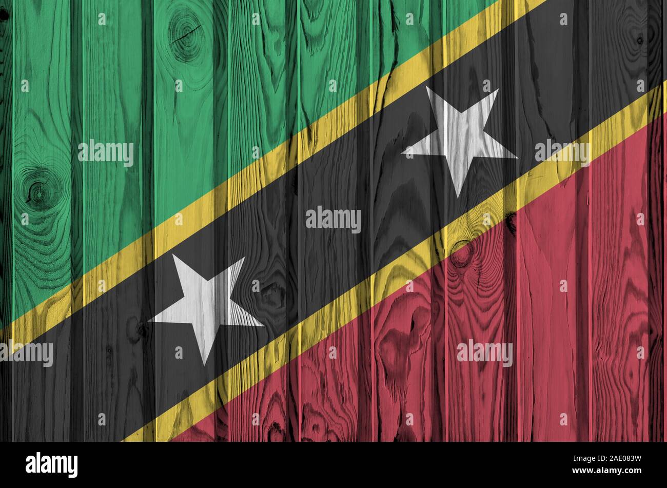 Saint Kitts and Nevis flag depicted in bright paint colors on old ...