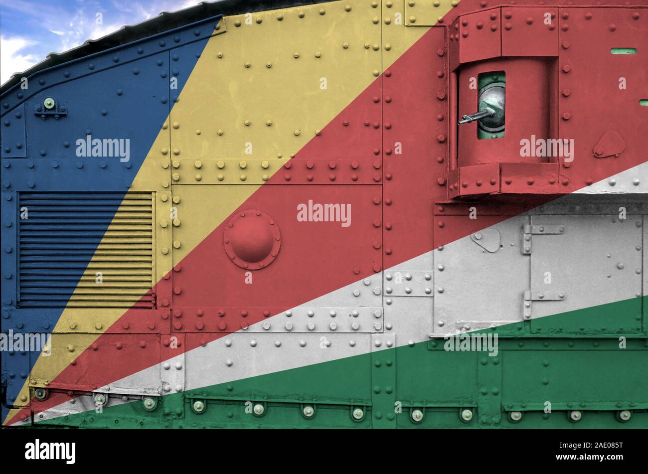 Seychelles flag depicted on side part of military armored tank close up ...