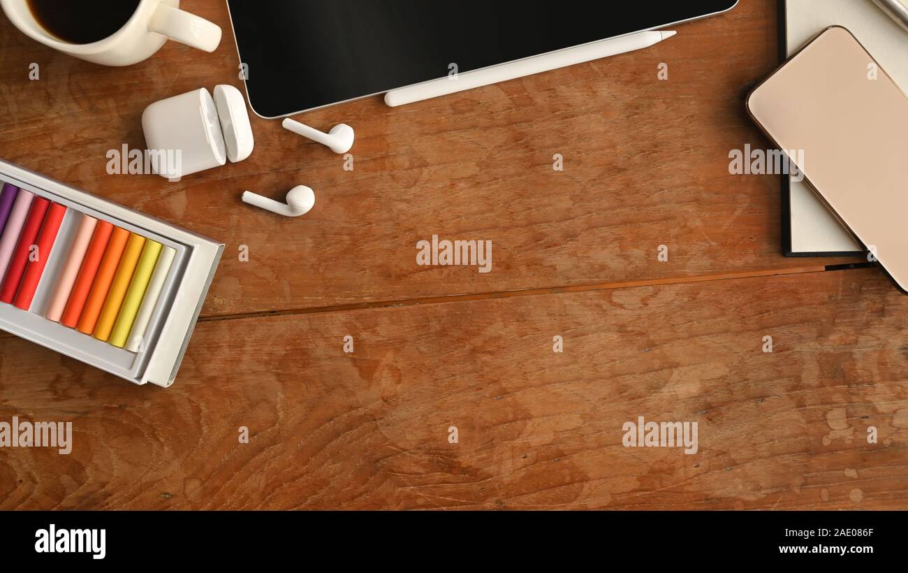 Device gadget on creative table with top view Stock Photo - Alamy
