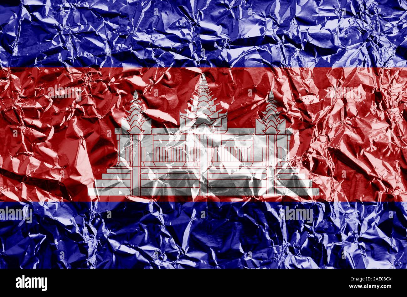 Cambodia flag depicted in paint colors on shiny crumpled aluminium foil ...