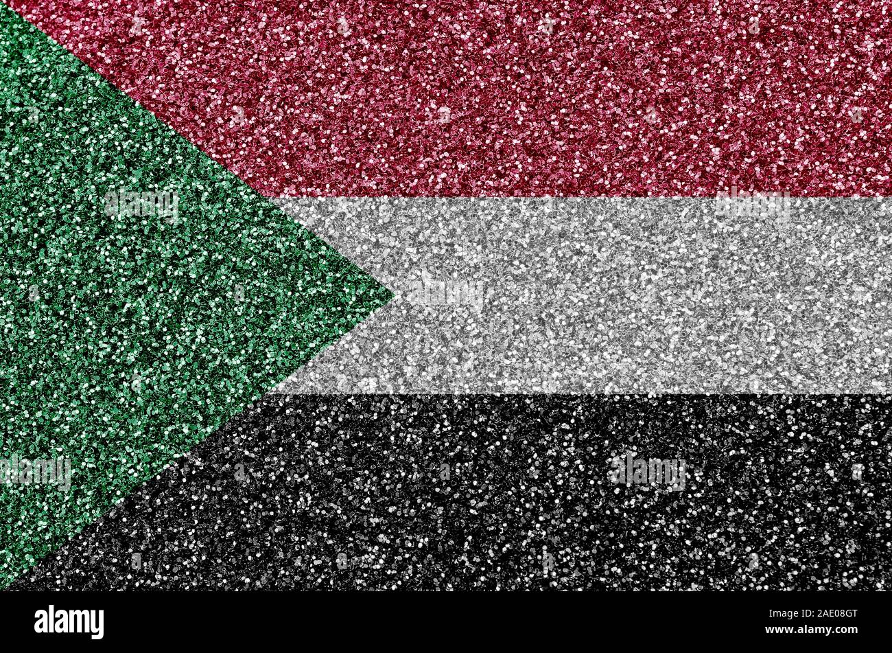 Sudan flag depicted on many small shiny sequins. Colorful festival ...